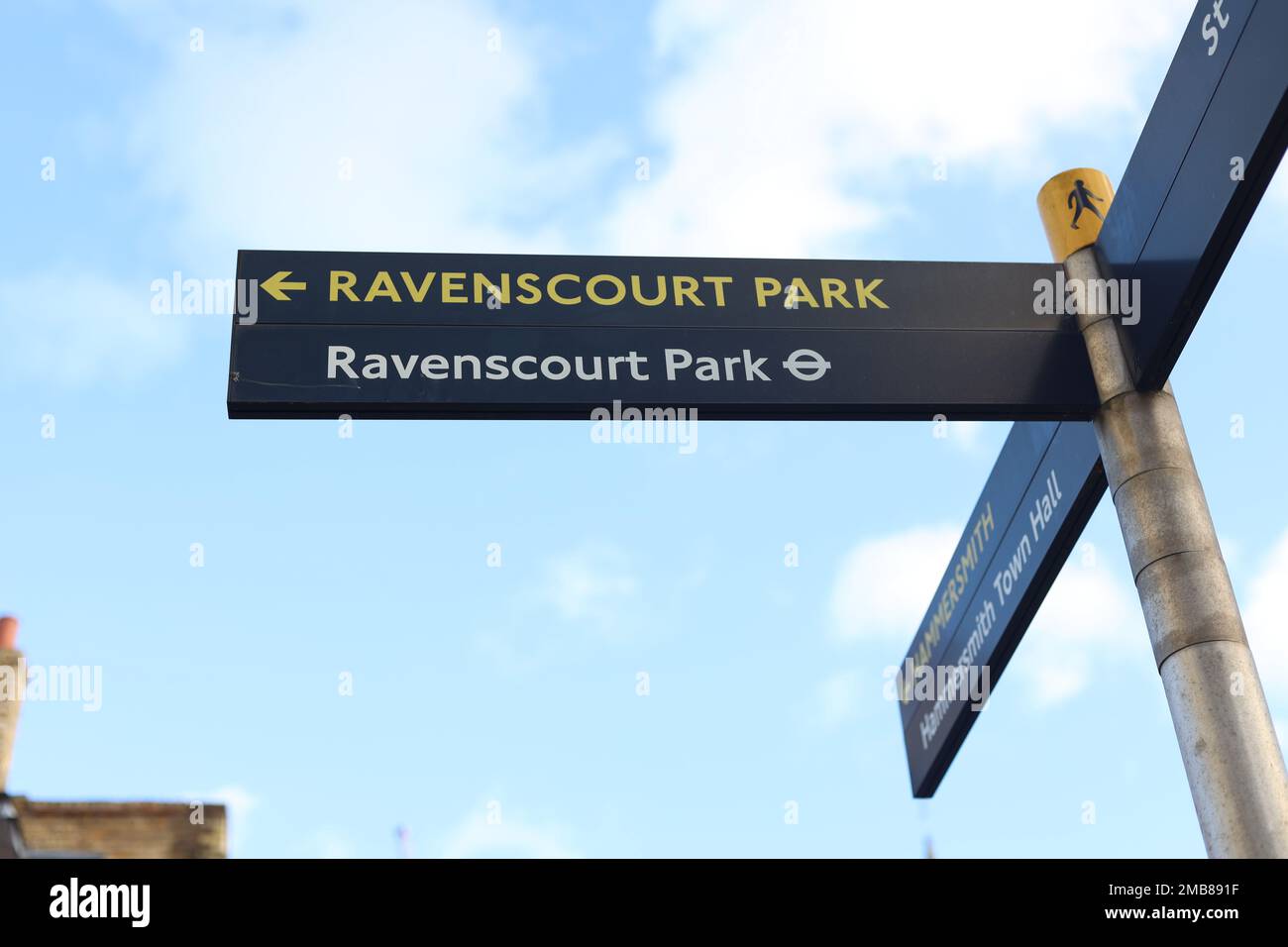 Pedestrians walk toward sign hi-res stock photography and images - Alamy