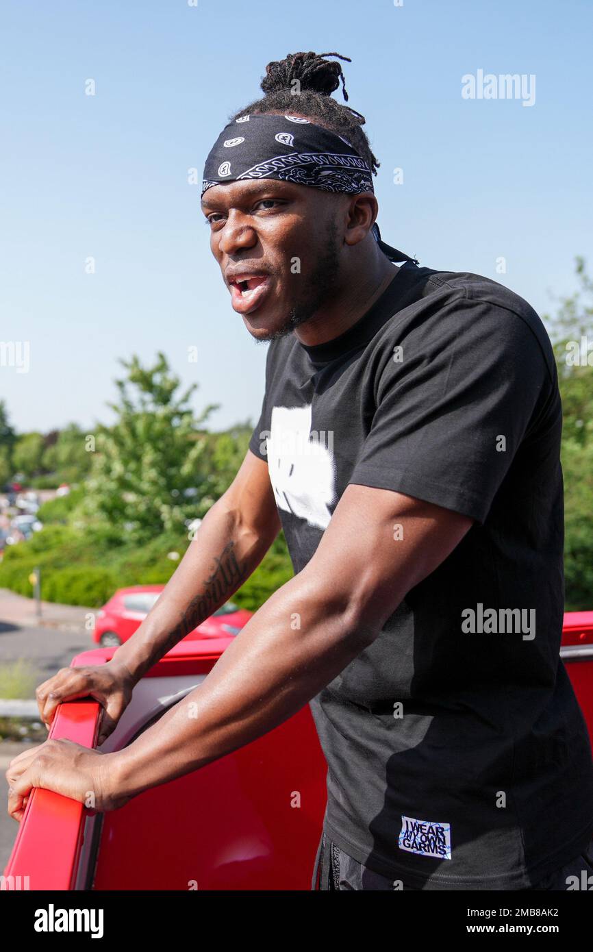 KSI poses for a photographer to promote an energy drink whilst on an ...