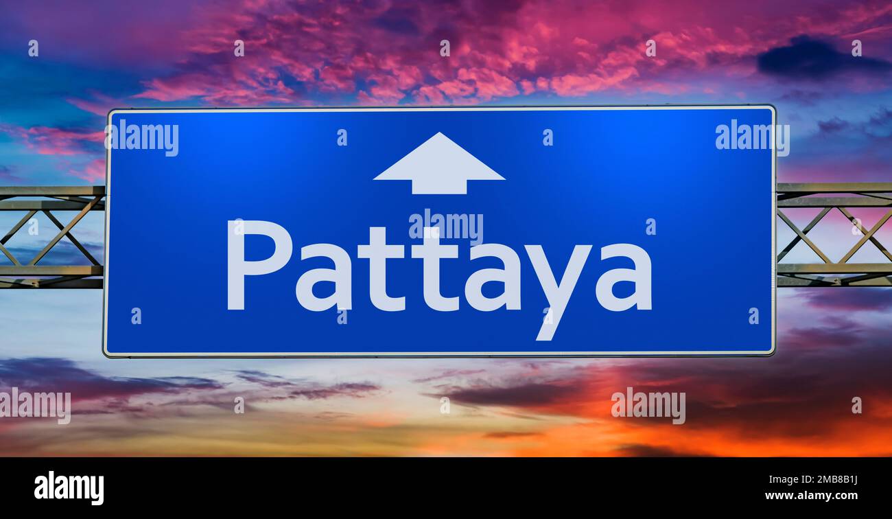 Road sign indicating direction to the city of Pattaya Stock Photo - Alamy
