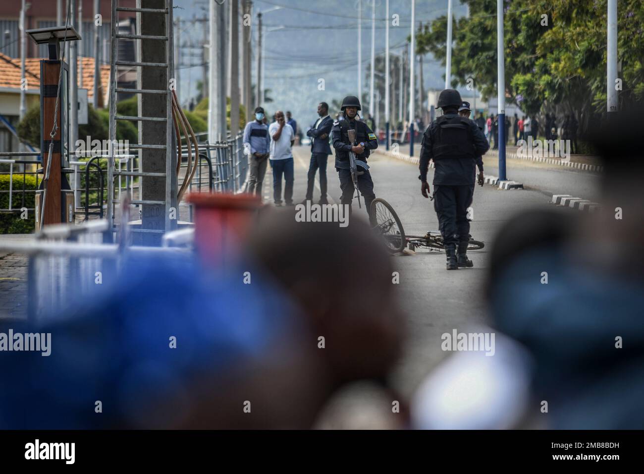 Rwandan border security forces stand guard on their side of the Petite ...