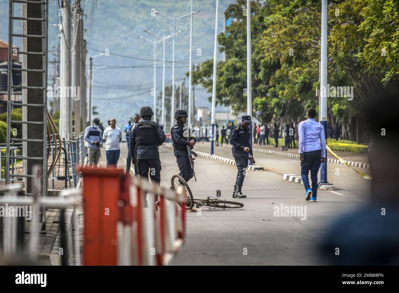 Rwandan border security forces stand guard on their side of the Petite ...