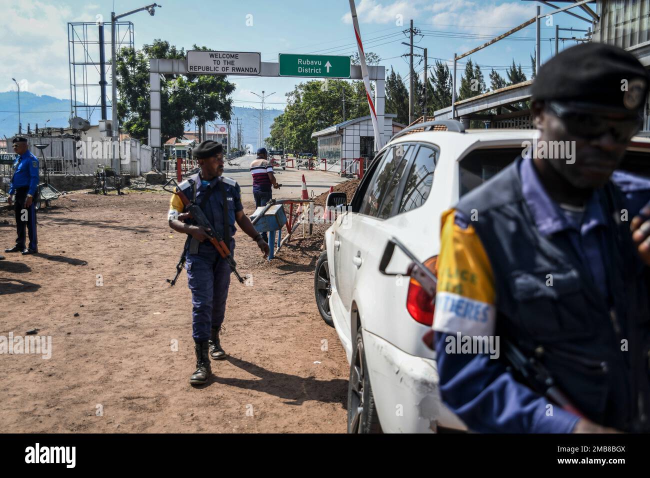 Congolese border police patrol on their side of the Petite Barriere ...