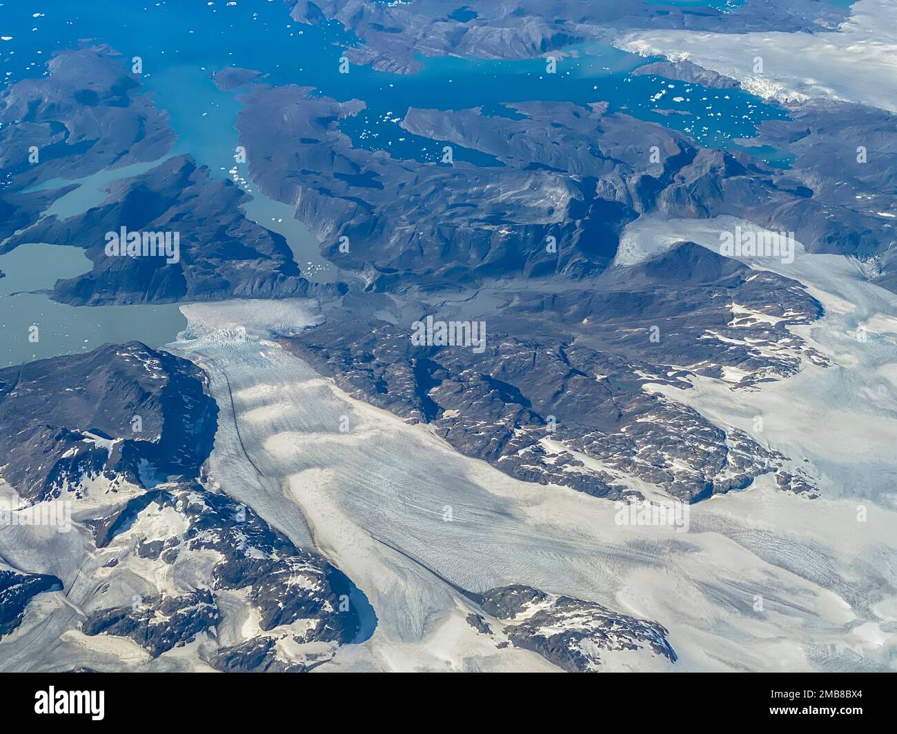 Aerial view of western Greenland Ice Sheet or Inland Ice as it covers ...