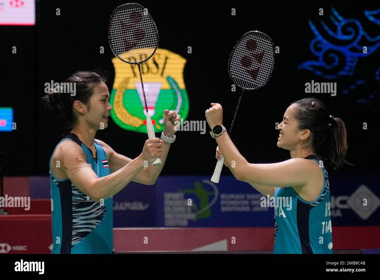 Jongkolphan Kitthitharakul, left, and Rawinda Prajongjai of Thailand ...
