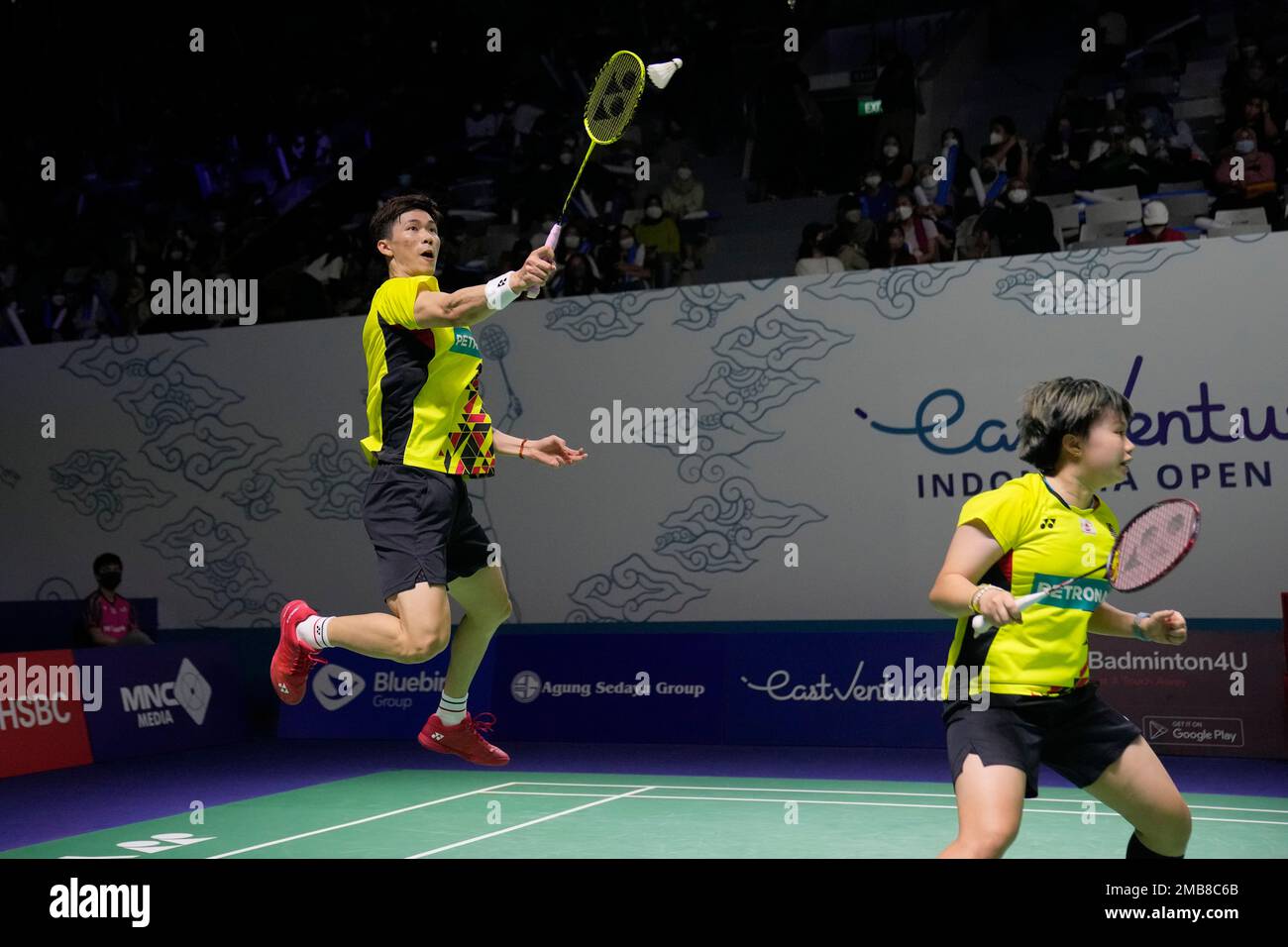Malaysia's Chen Tang Ji, left, and Valeree Siow compete against China's ...