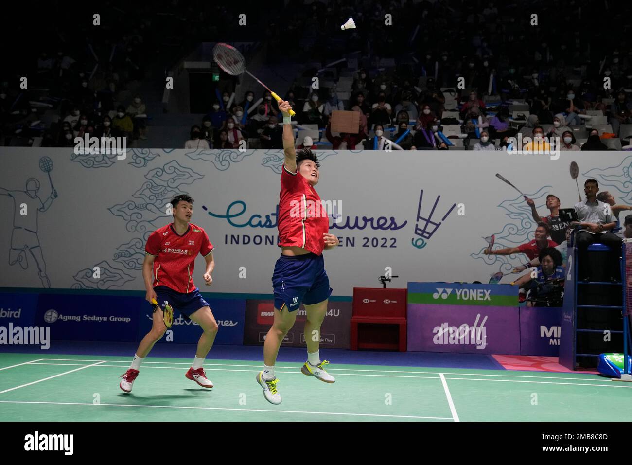 China's Wang Yi Lyu, left, and Huang Dong Ping compete against Malaysia ...