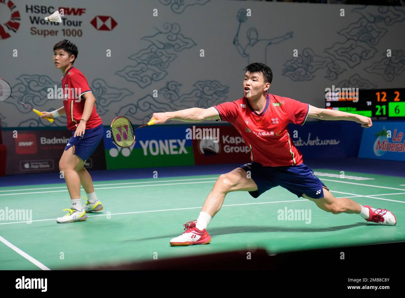 China's Wang Yi Lyu, right, and Huang Dong Ping compete against ...
