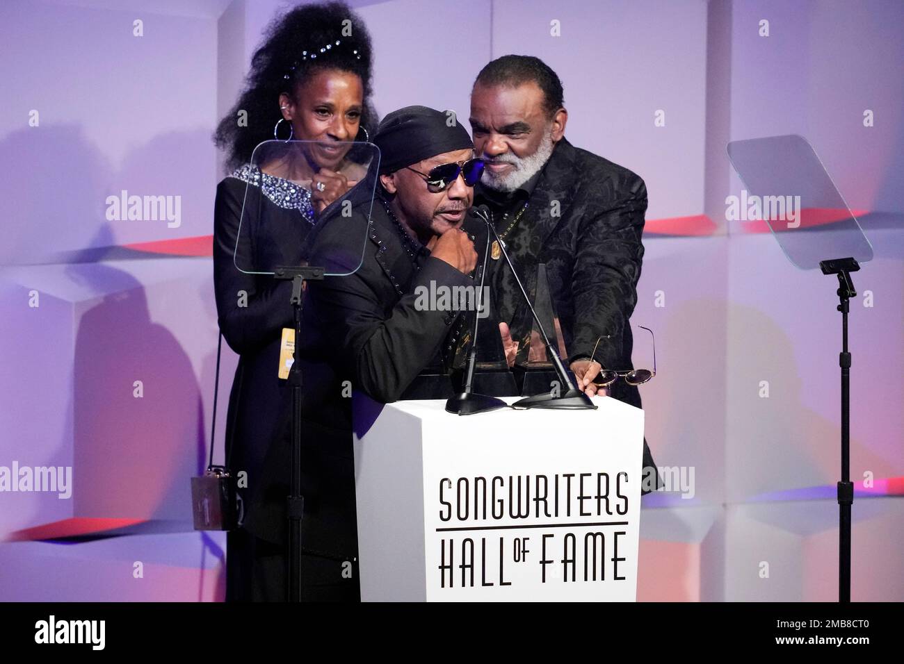 Elaine Isley Goodstone, left, Ernie Isley and Ron Isley, right, speak ...