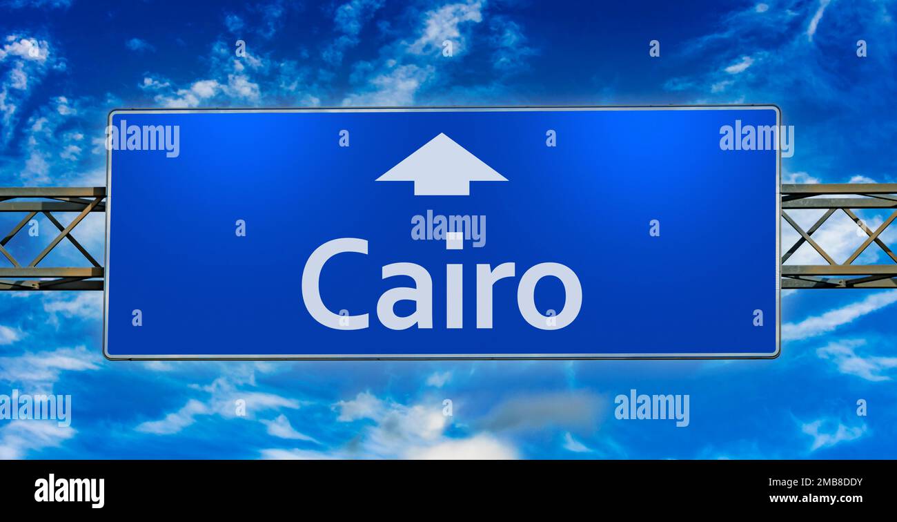 Road sign indicating direction to the city of Cairo Stock Photo - Alamy