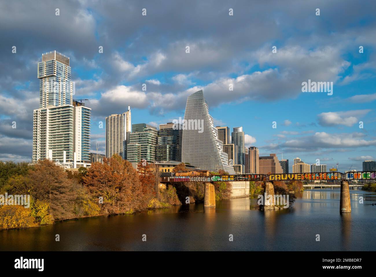 West Austin skyline with railroad bridge and Ladybird Lake Stock Photo ...