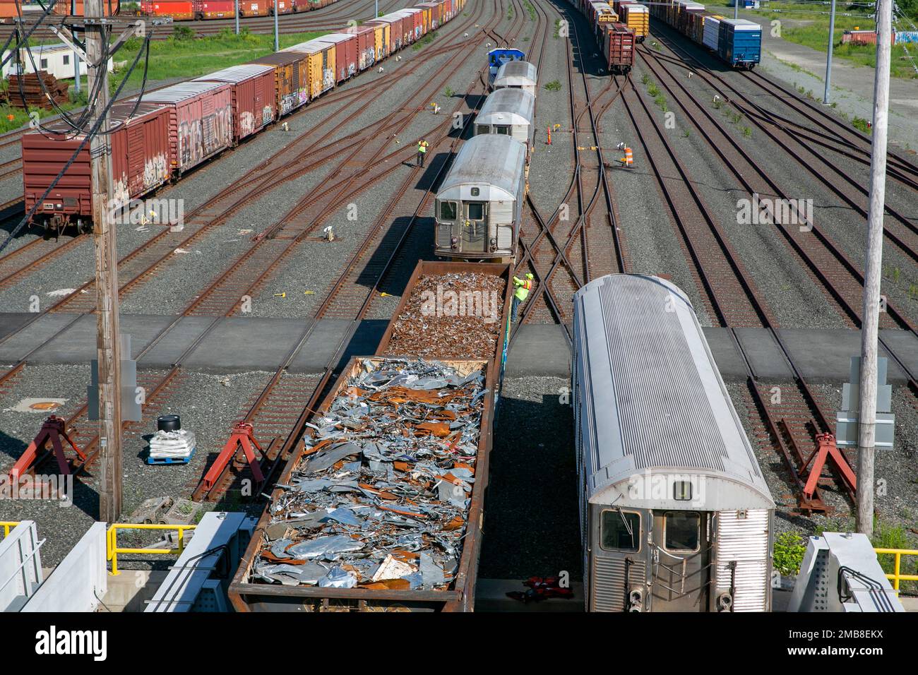 Railroad barge workers offload retired 1960s-era New York City R-32 ...