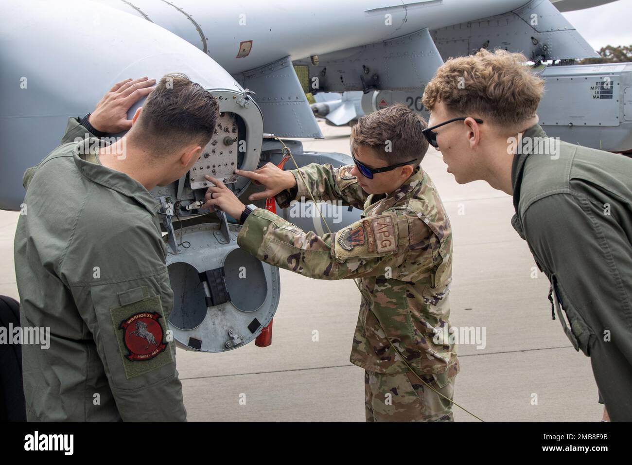 U.S. Marines with 3rd Marine Aircraft Wing and a U.S. Air Force airman ...