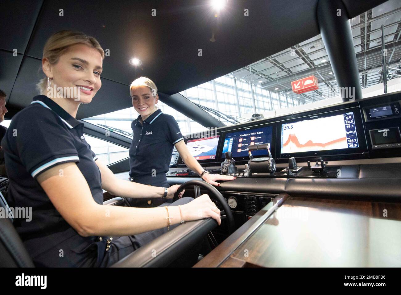 The twins Nina and Julia MEISE, "Ratiopharm twins", pose in the cockpit ...