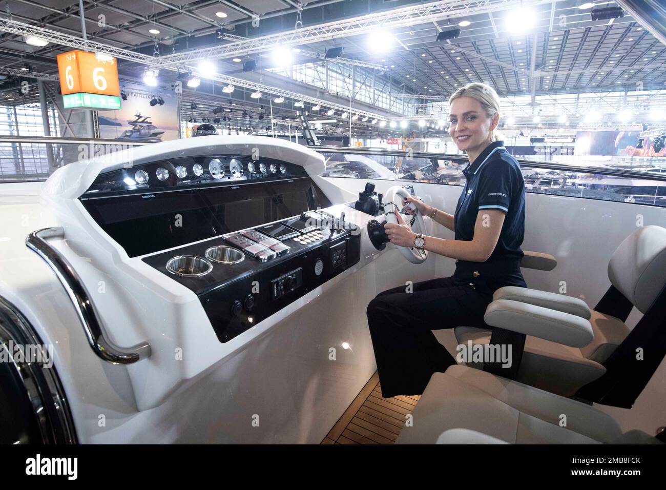 The twins Nina and Julia MEISE, "Ratiopharm twins", pose in the cockpit ...