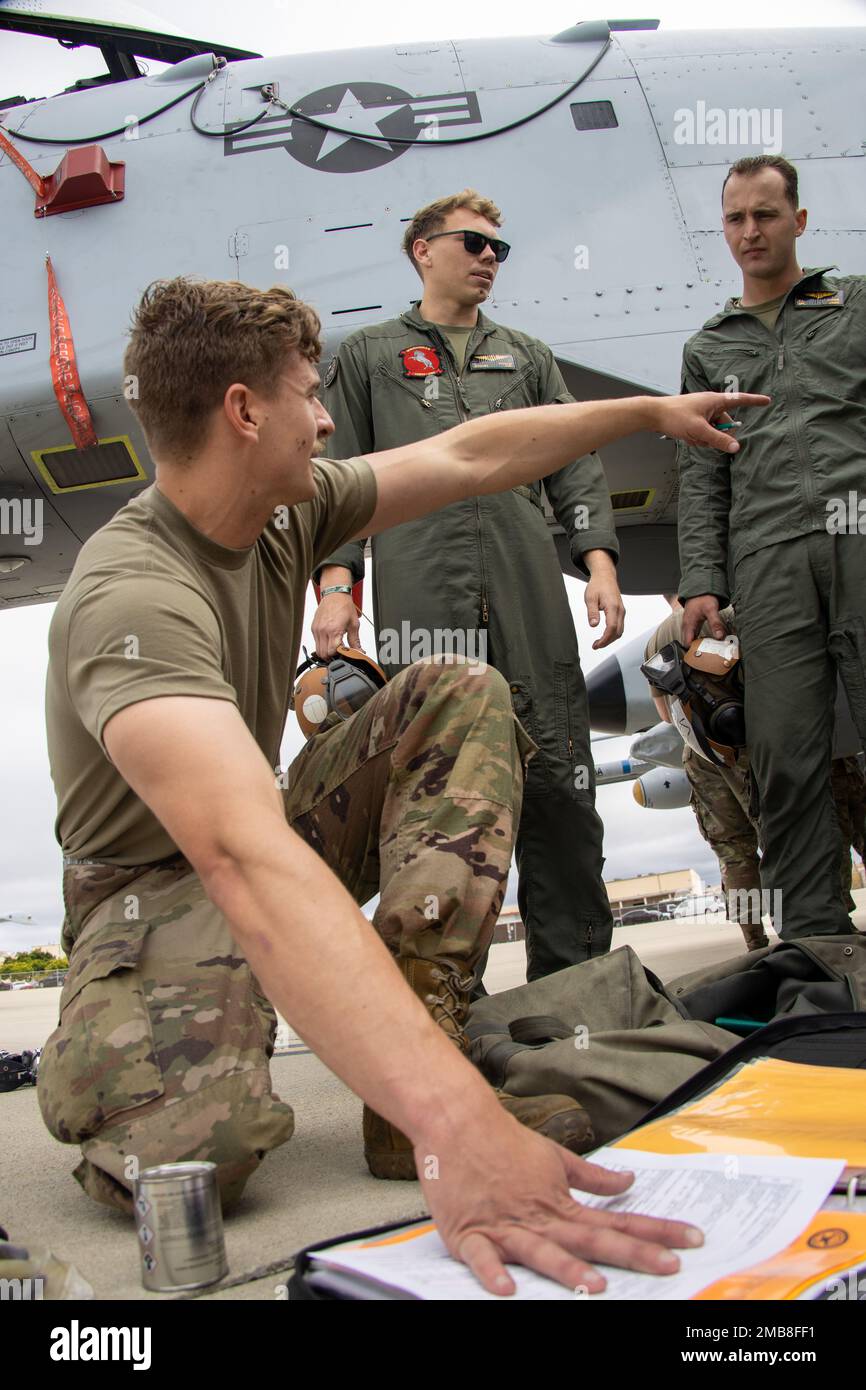 U.S. Marine Corps Sgt. Taylor Poggione and Cpl. Thomas Tunks-Wilson ...