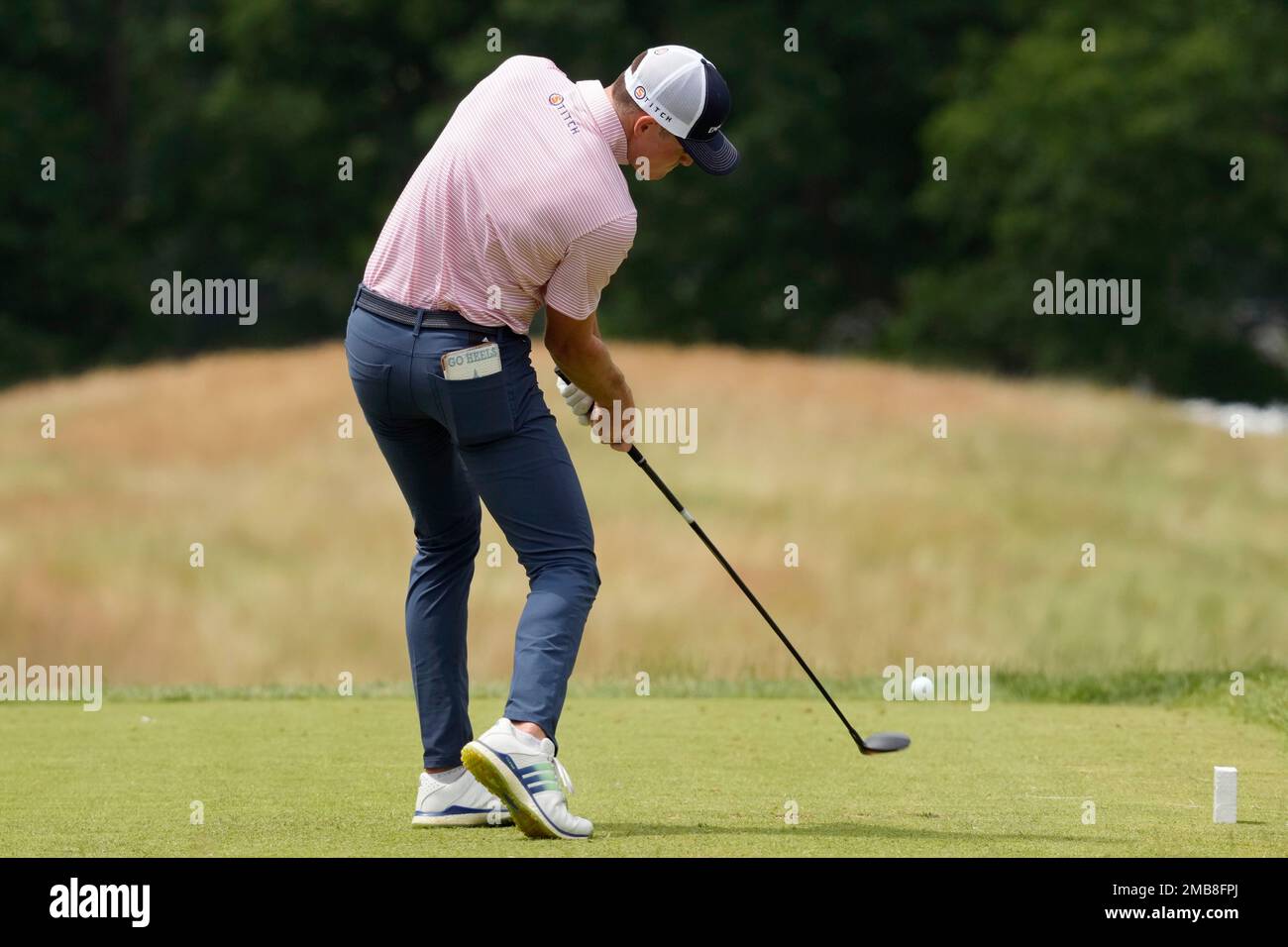 Austin Greaser hits on the 13th hole during the first round of the U.S ...