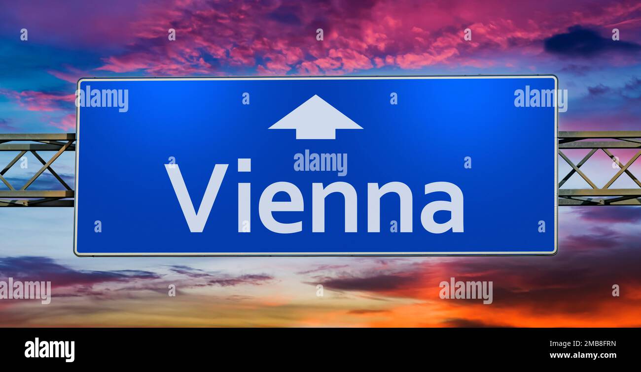 Road sign indicating direction to the city of Vienna Stock Photo - Alamy