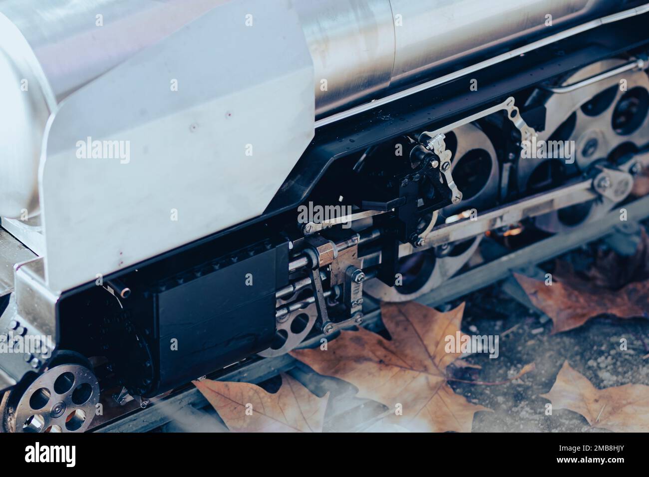 Old steam train wheel mechanism on a railway Stock Photo - Alamy