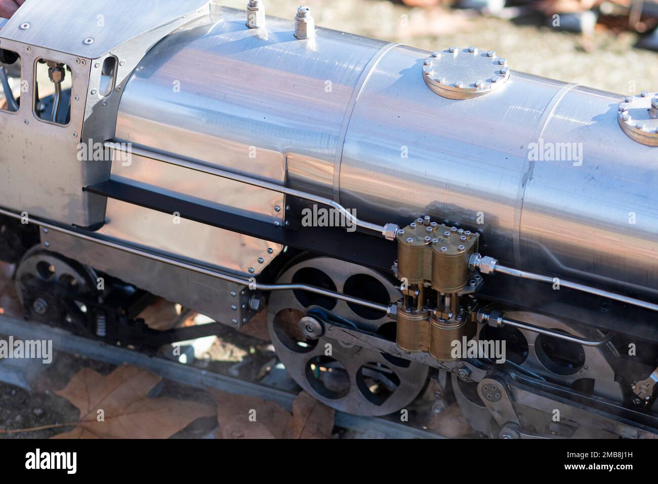 Old steam train wheel mechanism on a railway Stock Photo - Alamy