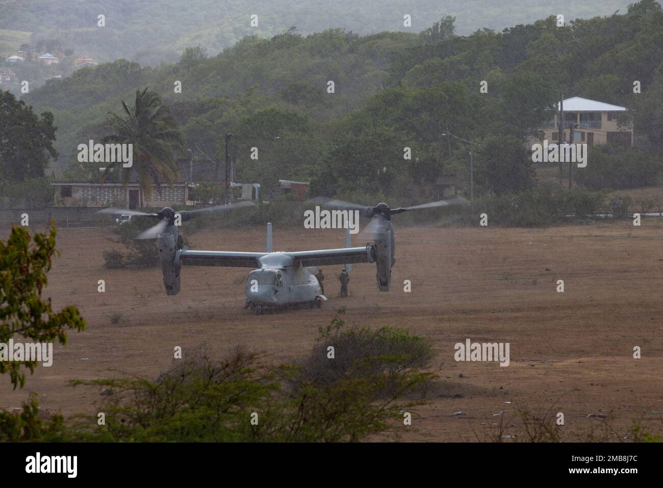 U.S. Marines with Marine Medium Tiltrotor Squadron (VMM) 266 unload ...