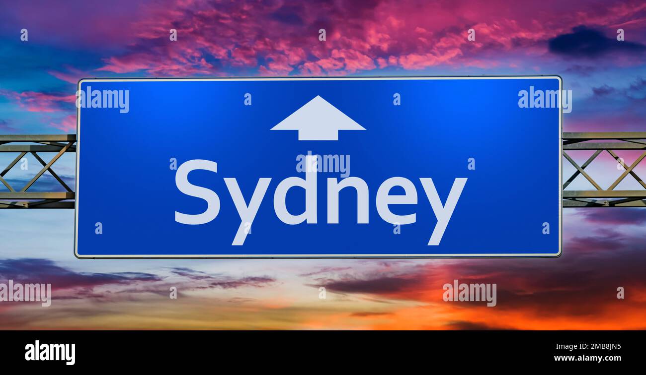 Road sign indicating direction to the city of Sydney Stock Photo - Alamy
