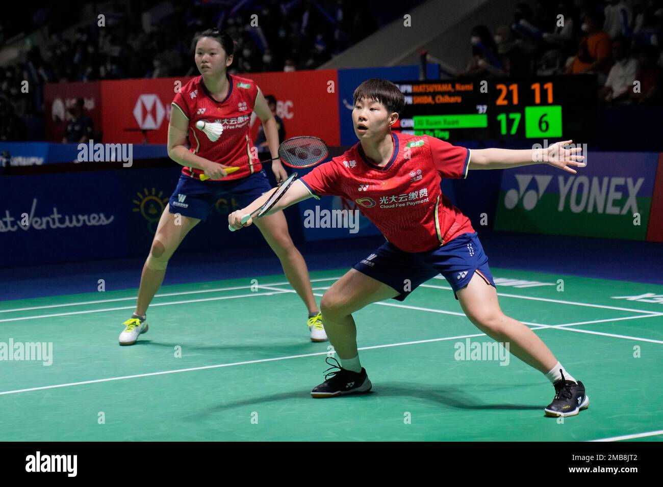 Liu Xuan Xuan, right, and Xia Yu Ting of China compete against Japan's ...