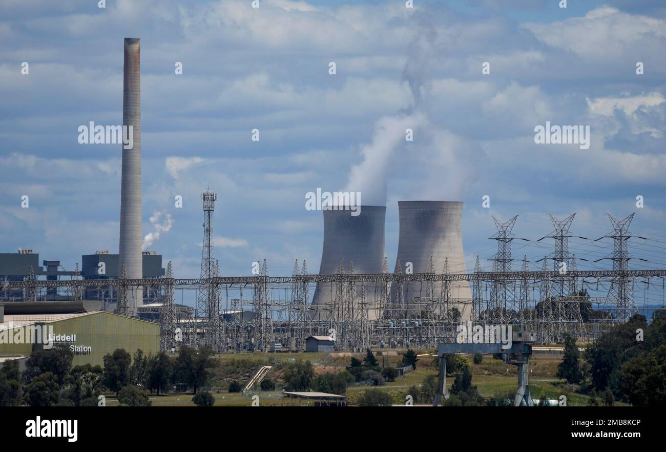 FILE - The Liddell Power Station, left, and Bayswater Power Station ...