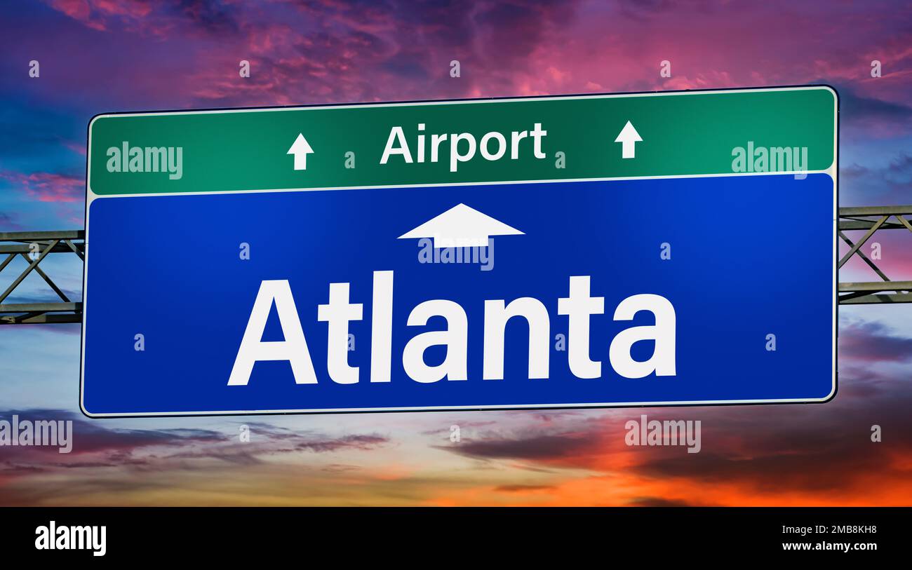 Road sign indicating direction to the city of Atlanta Stock Photo - Alamy