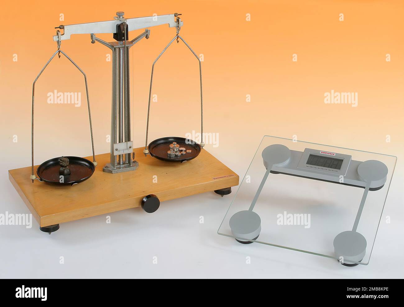An old and traditional scale or balance and a modern digital one Stock ...