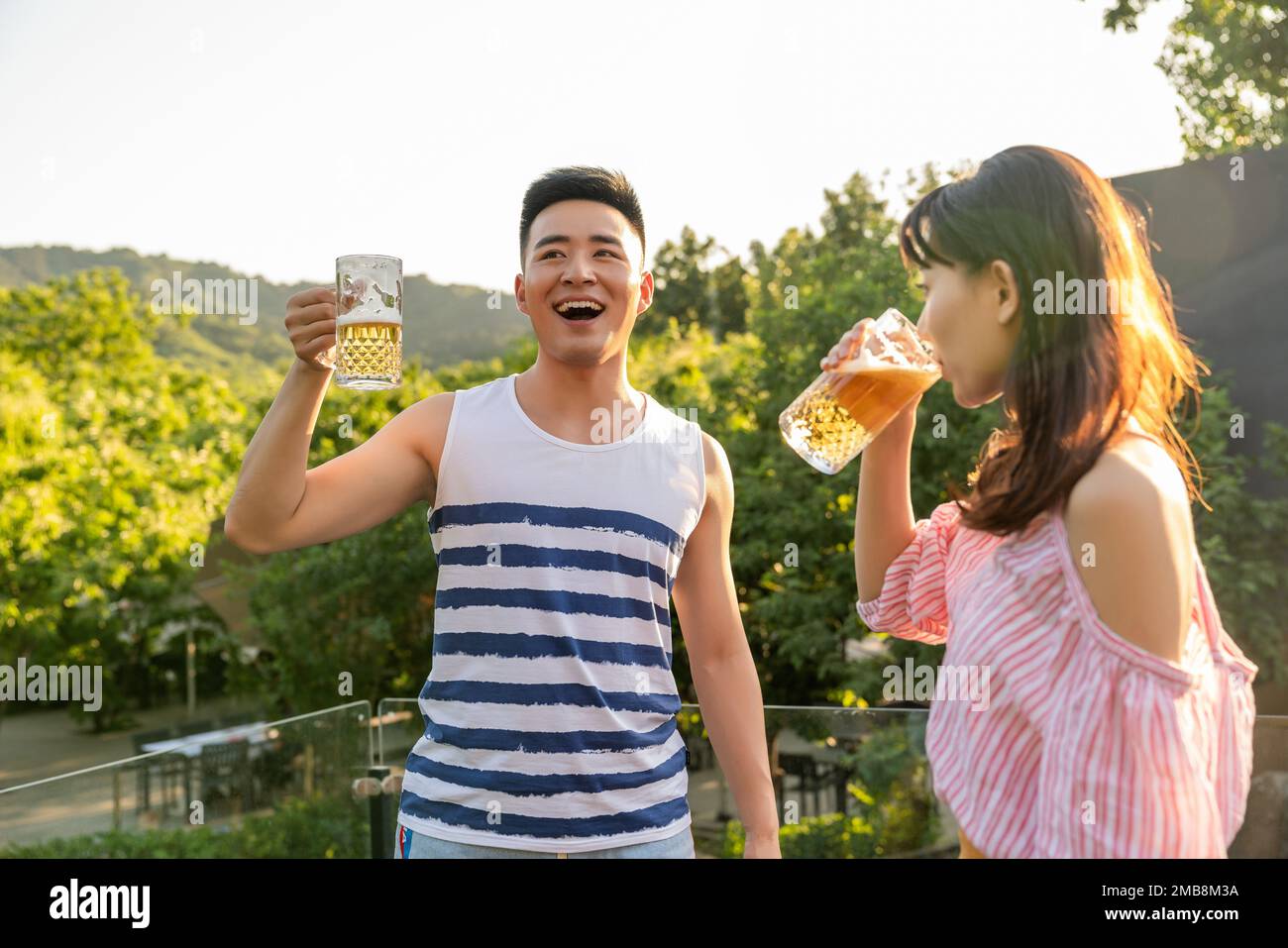 Chinese men drink beer hi-res stock photography and images - Alamy
