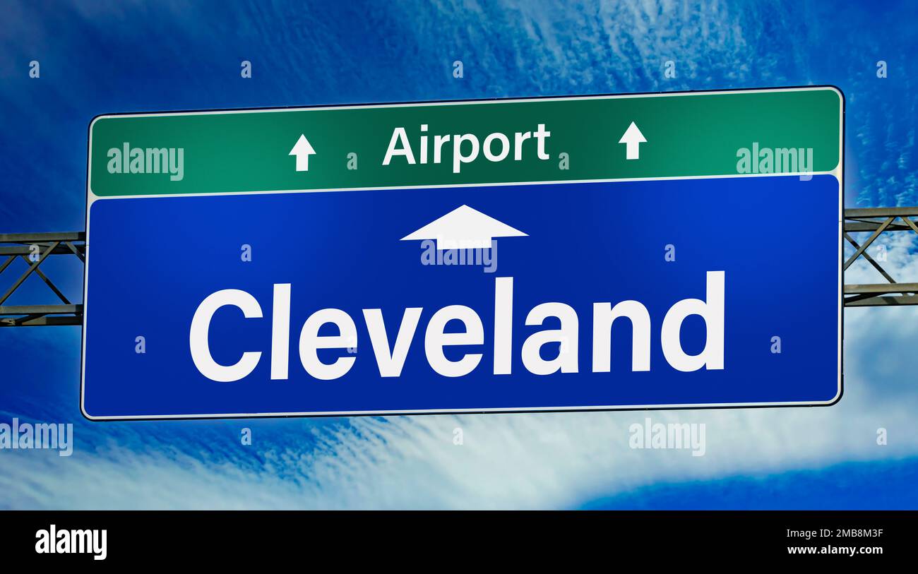 Road sign indicating direction to the city of Cleveland Stock Photo - Alamy