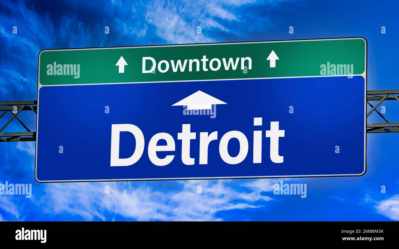 Road sign indicating direction to the city of Detroit Stock Photo - Alamy