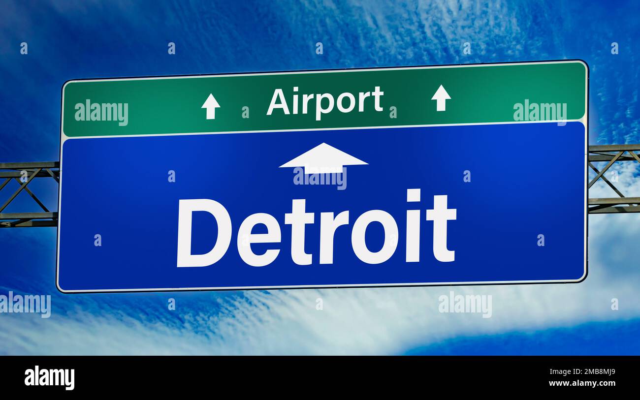 Road sign indicating direction to the city of Detroit Stock Photo - Alamy