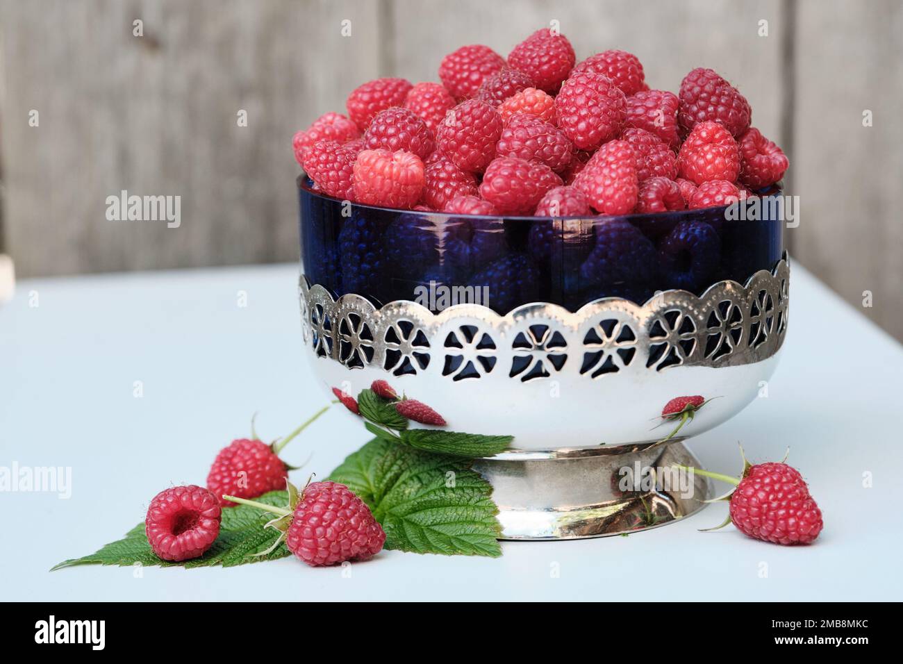 Fresh organic raspberries in a Vintage Glass Bowl with Metal Stand ...