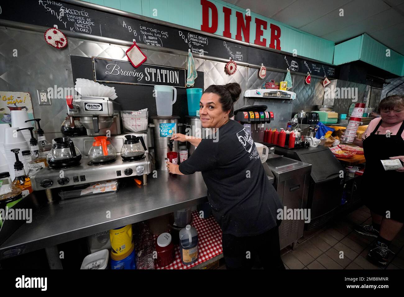 Tiffany Hollis, center, owner of the Dashing Diner, in Johnstown, Ohio ...