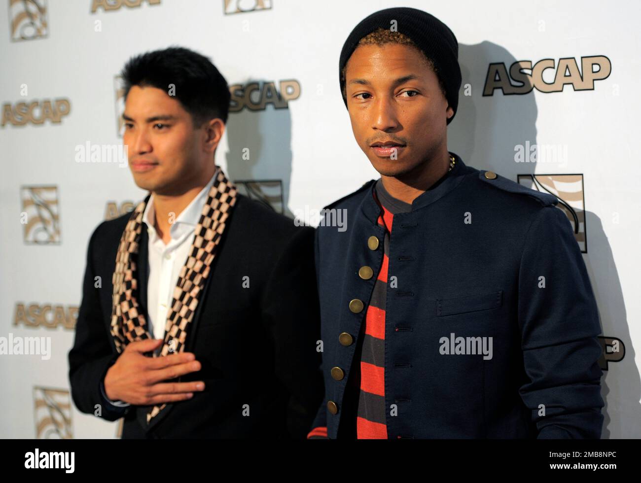 FILE - This June 29, 2012 file photo shows Pharrell Williams, right ...
