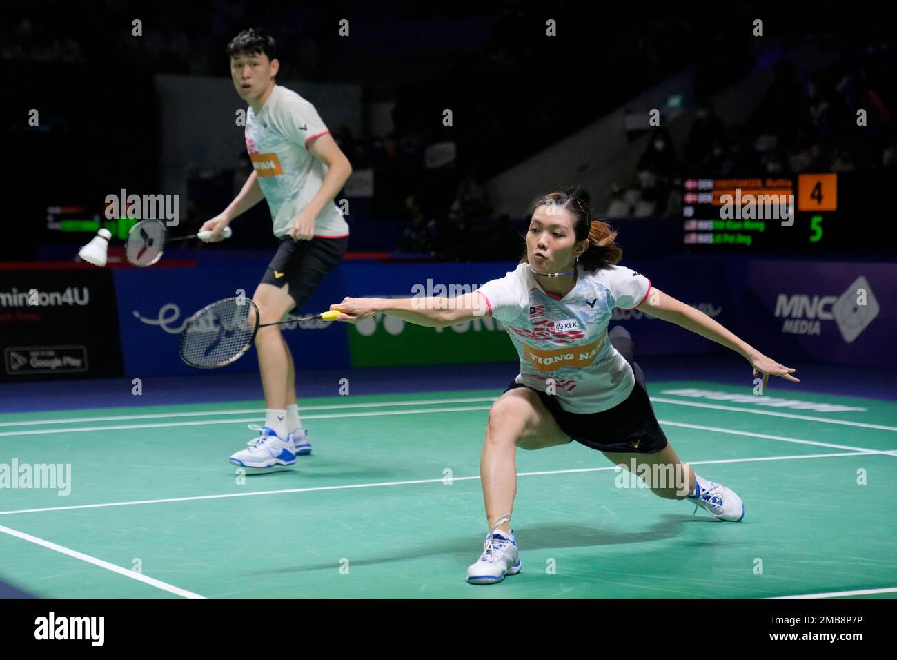 Malaysia's Tan Kian Meng and Lai Pei Jing, right, compete against ...