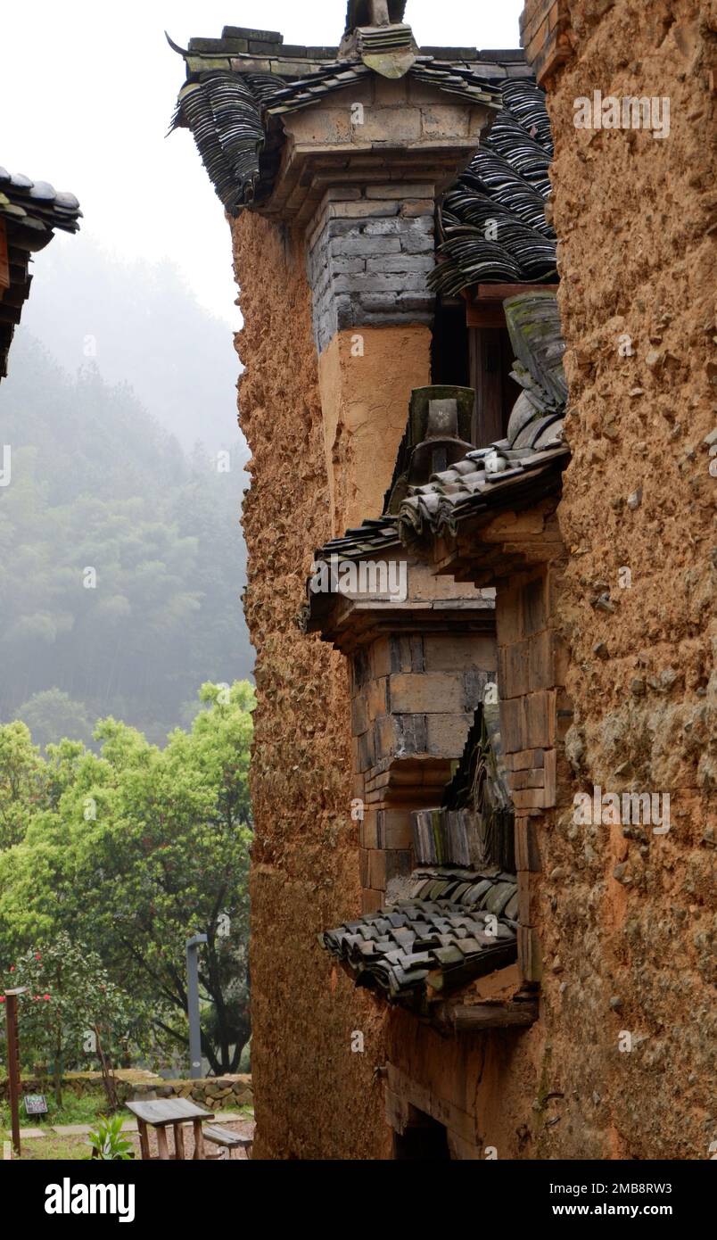 A vertical shot of an old building near the hills Stock Photo - Alamy