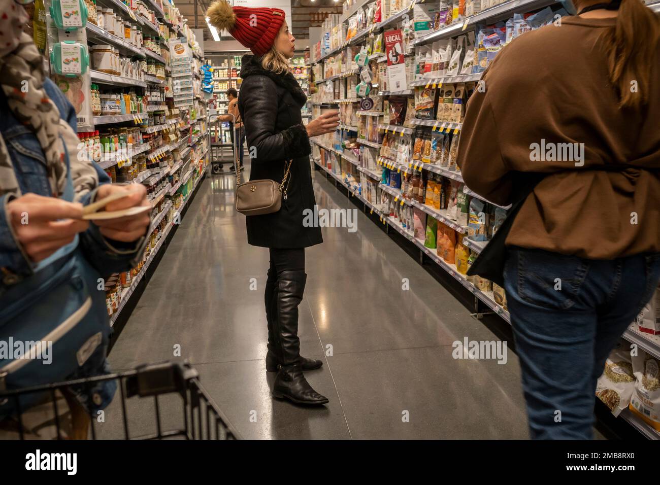 Shopping in a Whole Foods Market supermarket in New York on Friday ...