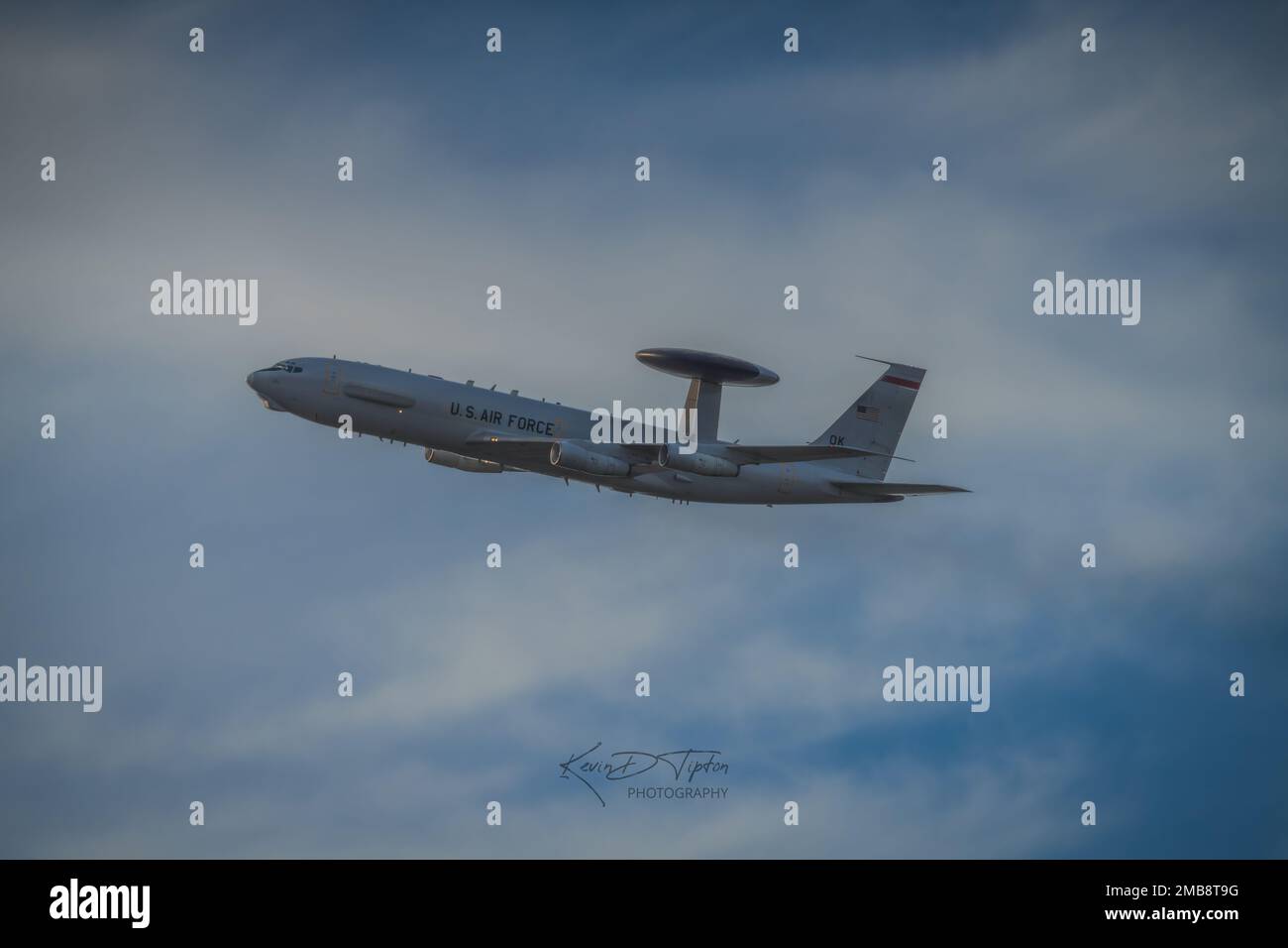 A low angle shot of an airplane in flight Stock Photo - Alamy