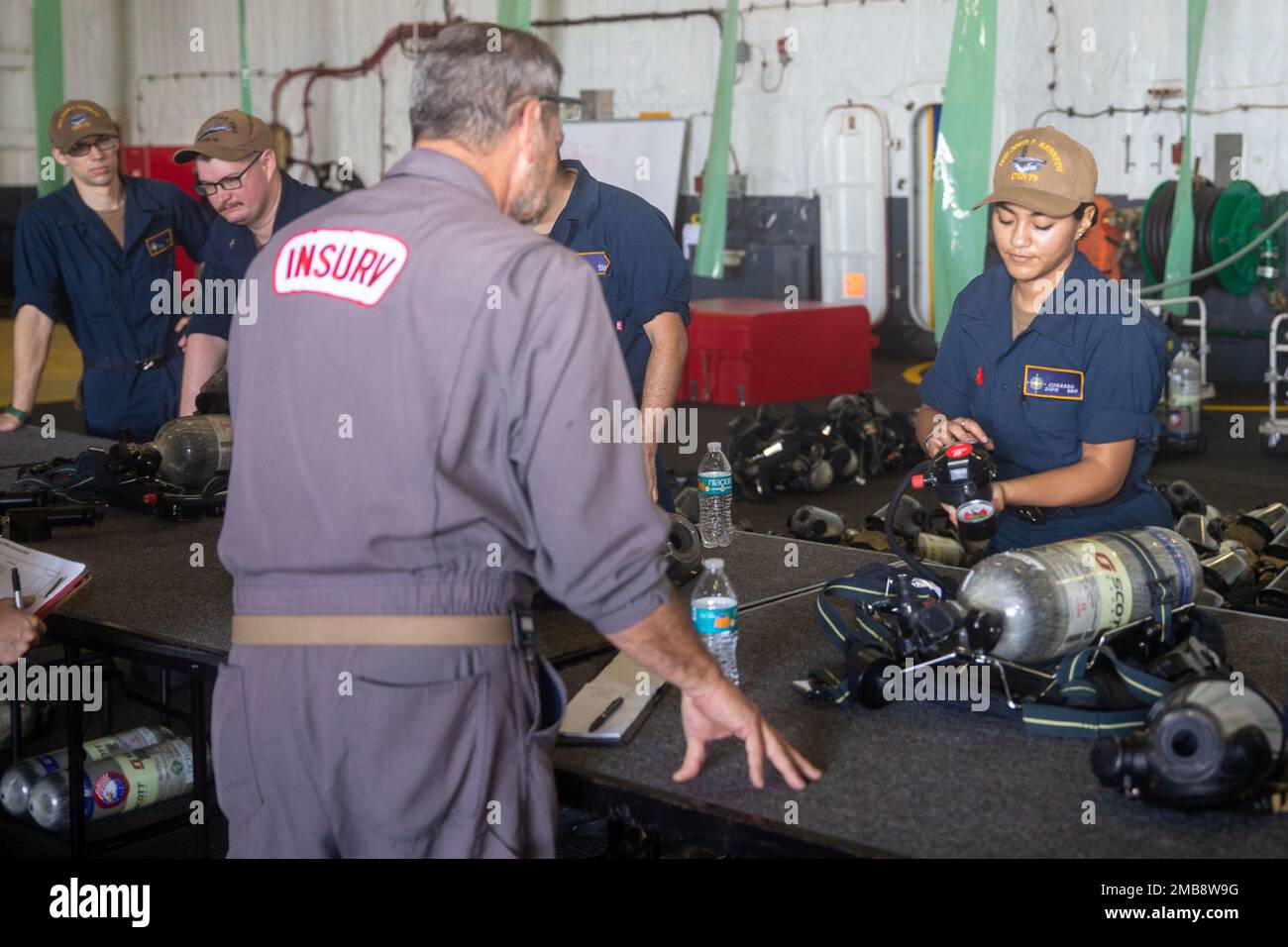 Damage Controlman Fireman Melissa Alvarado, right, from Dalton, Georgia ...