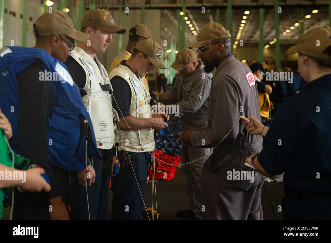 Board of Inspection and Survey (INSURV) inspector Ray Sanders, right ...
