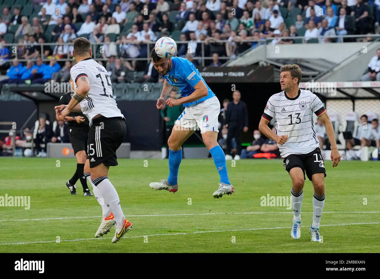 Italy's Davide Calabria, centre, heads the ball during the UEFA Nations ...