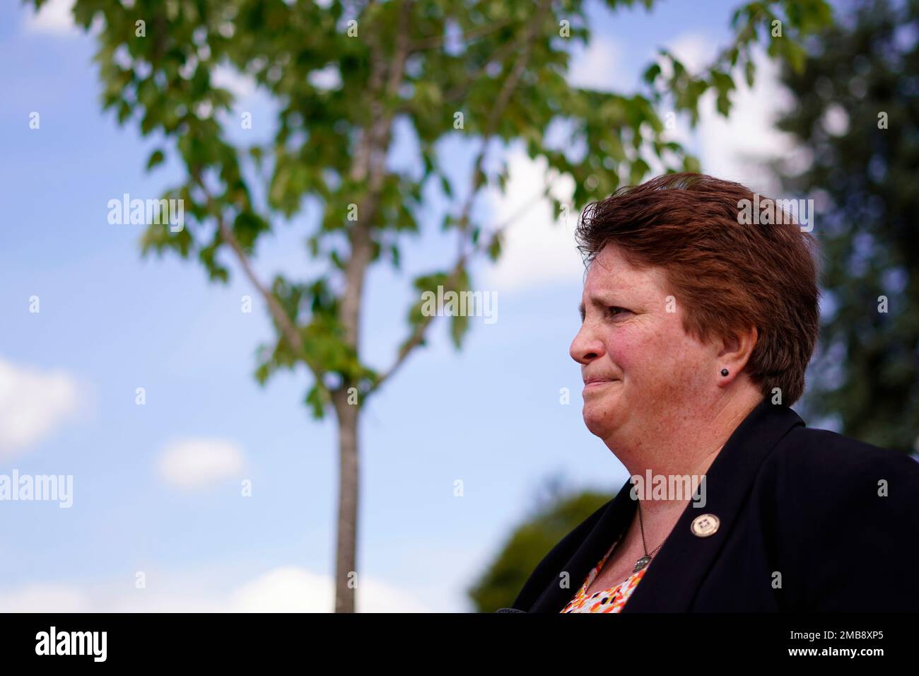 Renea Yates, Director of the Office of Army Cemeteries, pauses while ...