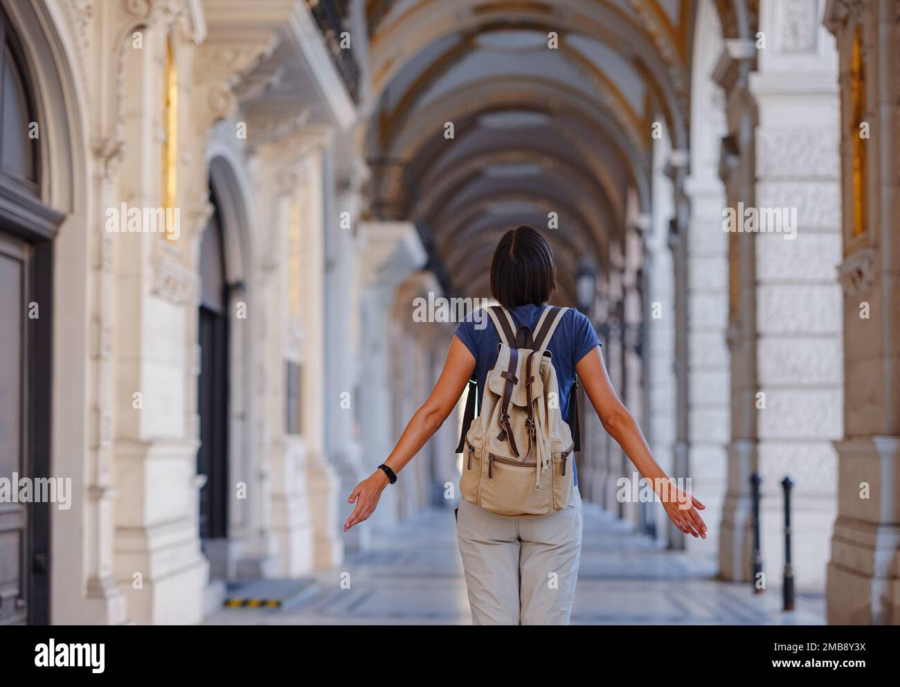 summer female solo trip to Europe, happy young woman walking on ...