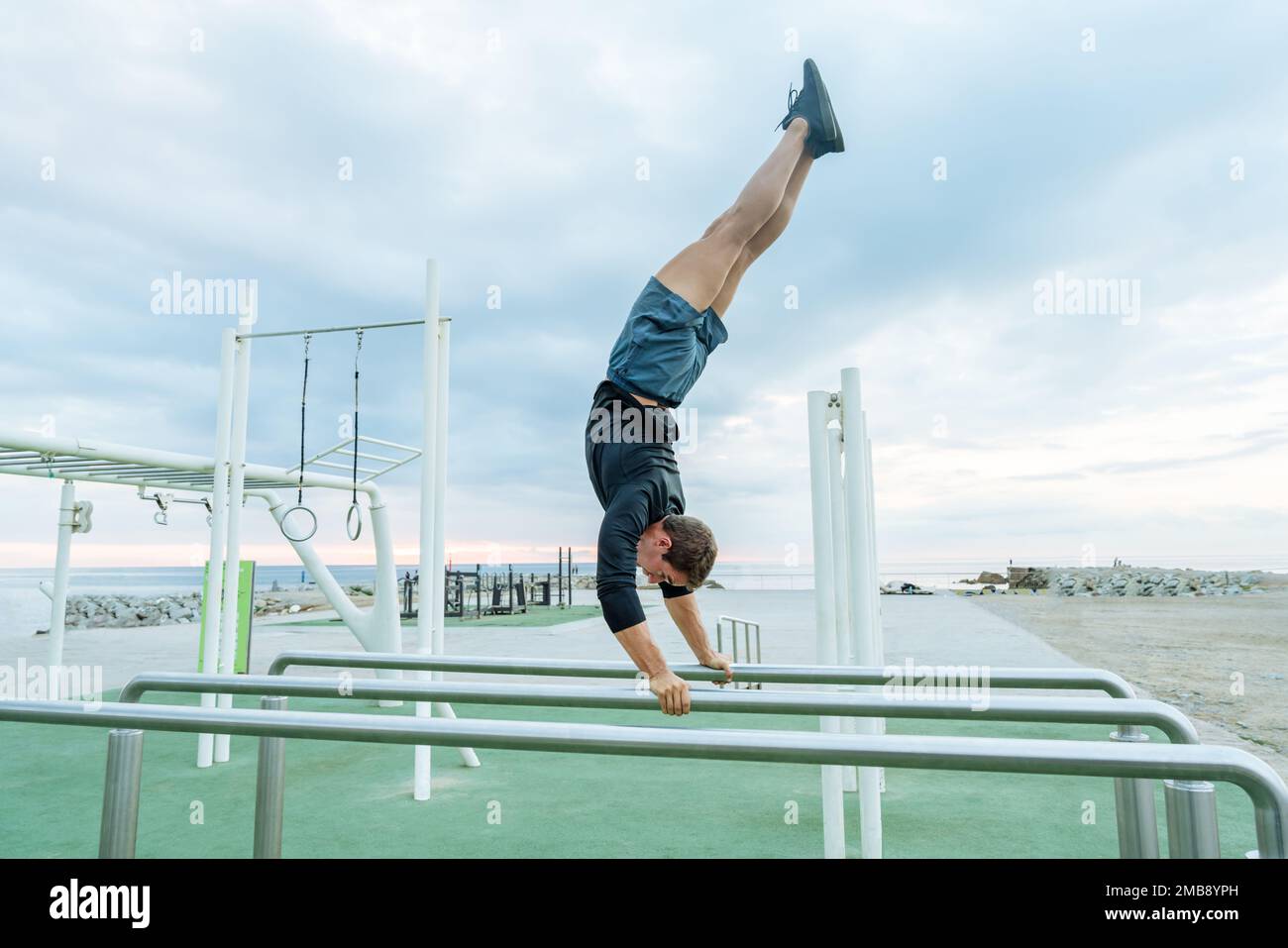 Sportive and athletic man doing functional training exercise at the ...