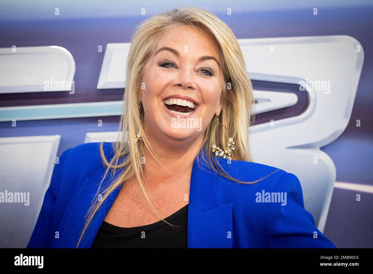 Lucy Alexander poses for photographers upon arrival for the premiere of ...