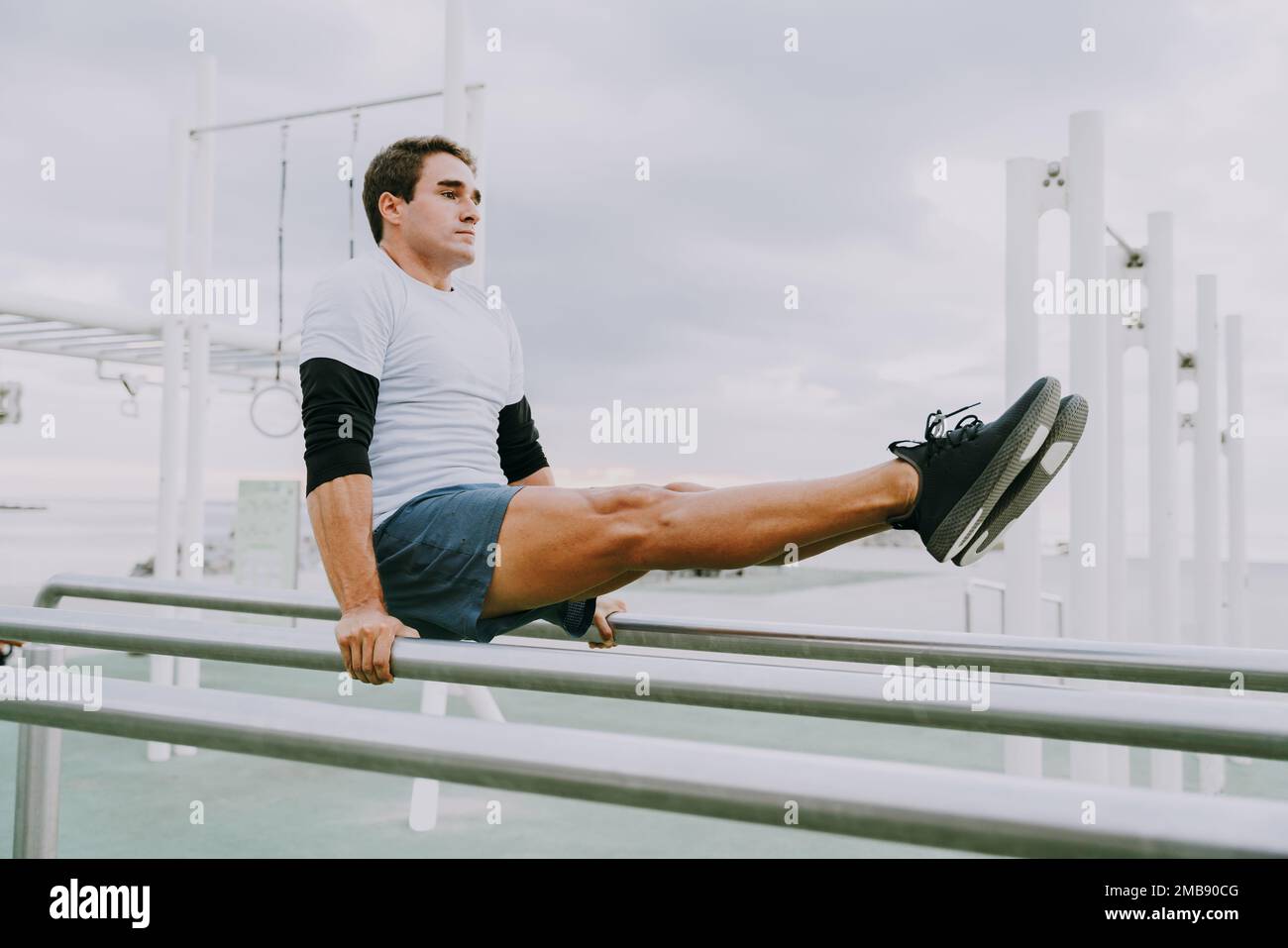 Sportive and athletic man doing functional training exercise at the ...