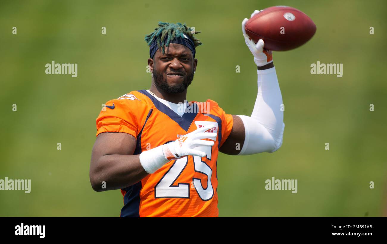 Denver Broncos running back Melvin Gordon III (25) takes part in drills ...