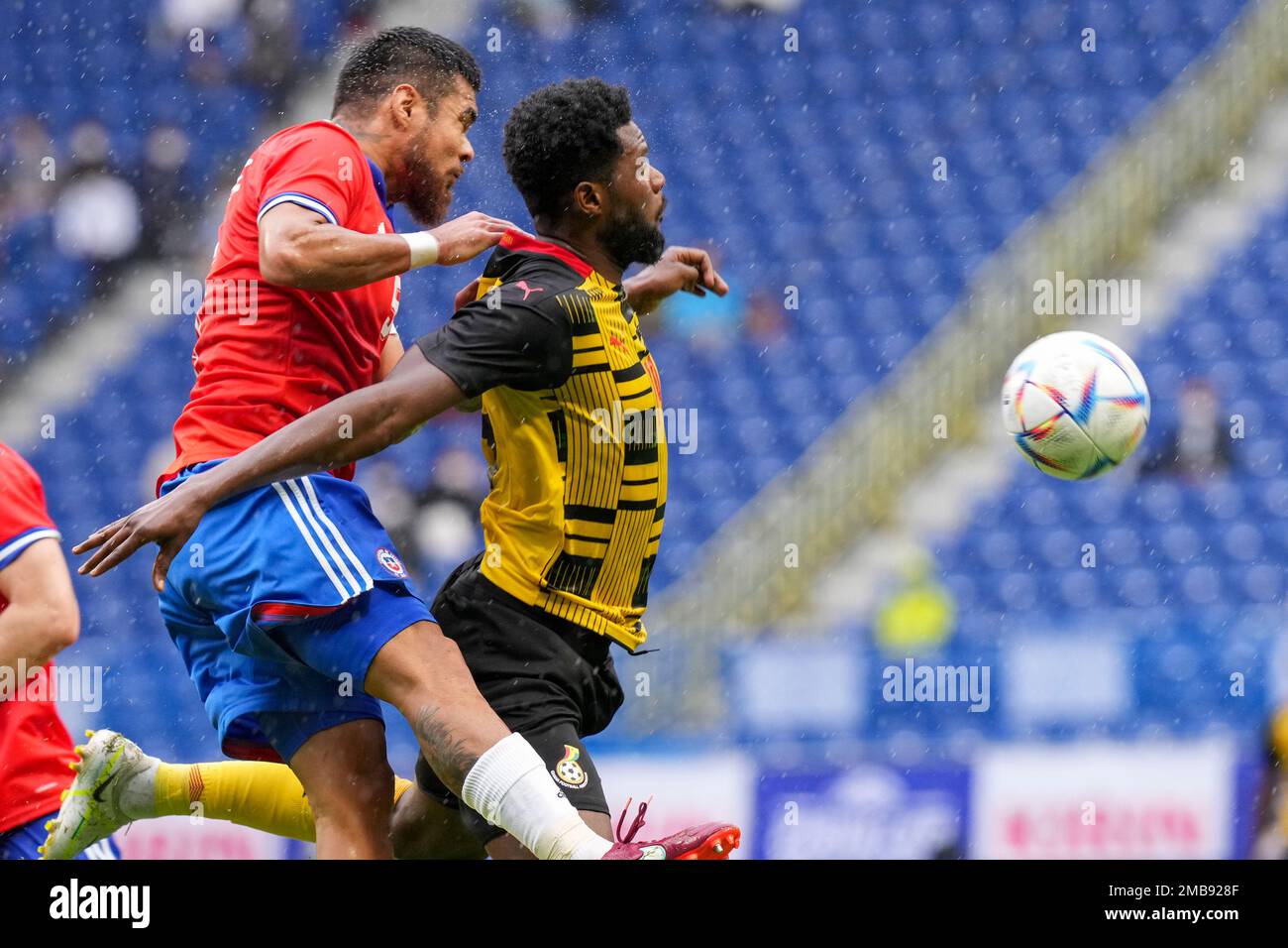 Chile's Paulo Diaz and Ghana's Benjamin Tetteh, right, battle for the ...